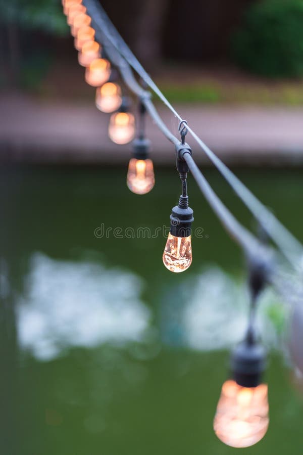 Stringing with Several Lights Hanging from the Sides of it Stock Image ...