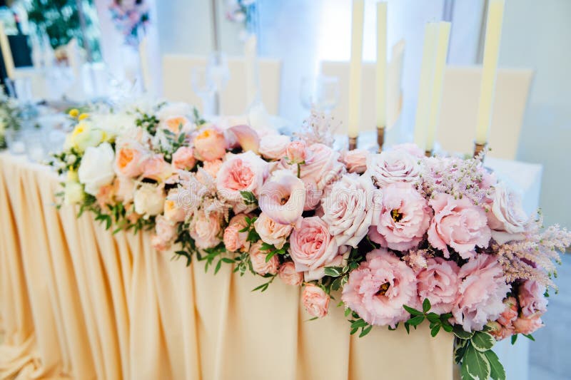 Festive Table for the Bride and Groom Decorated with Cloth and Flowers Stock Image - Image of ...