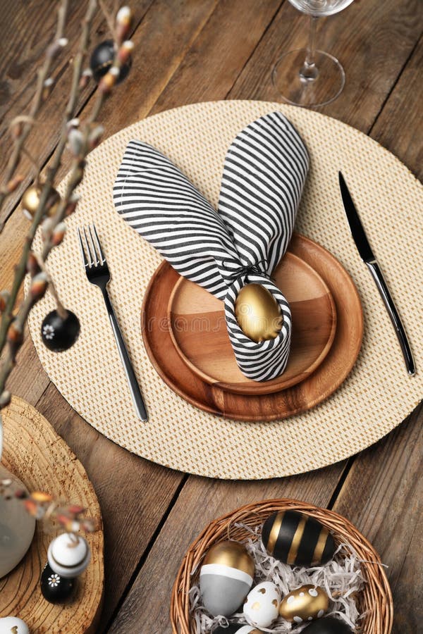 Festive Table Setting with Painted Eggs, Plates and Willow Twigs, Above ...