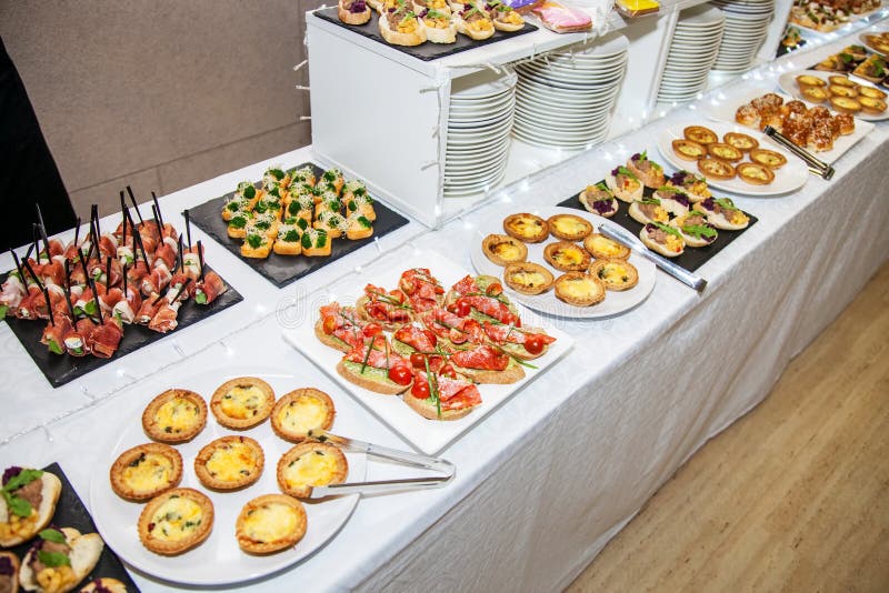 Festive table with snacks stock photo. Image of food - 113675834