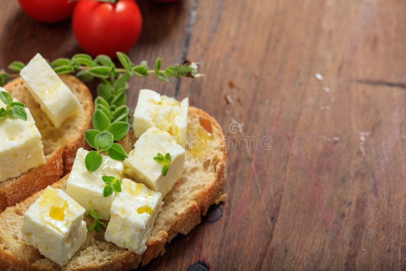 Feta Cheece Pieces on Wooden Background Stock Image - Image of herb ...