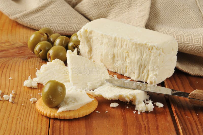 Feta Cheese with Crackers and Olives Stock Photo - Image of food ...