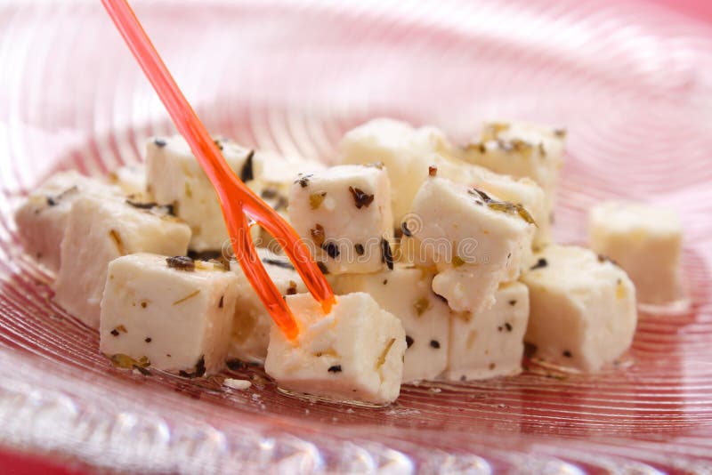 Feta cheese cubes stock image. Image of food, spice, fork - 38620881