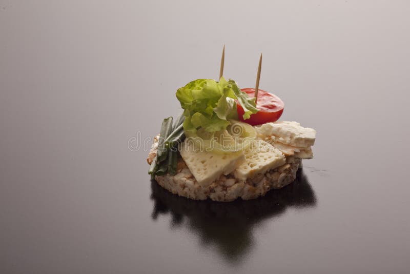 Feta cheese on a rice cake stock image. Image of eating - 28856553