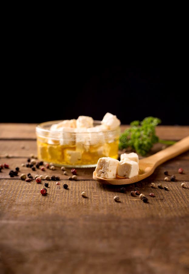 Feta cheese stock image. Image of spoon, close, herbs - 66828505