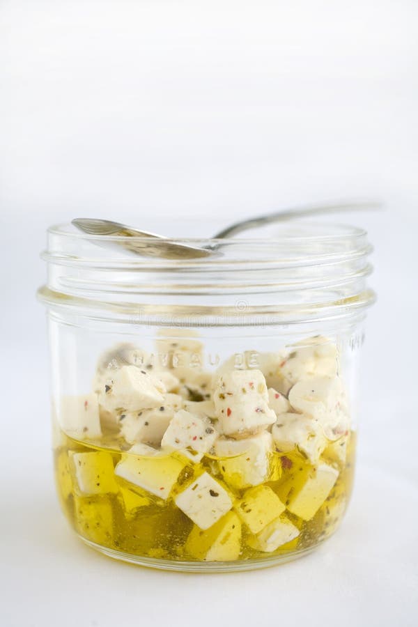 Feta in olive oil stock photo. Image of dinner, green - 2001132