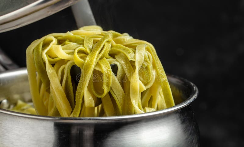 Fettuccine Pasta in Pan Cooking in Boiling. Top View Stock Photo ...