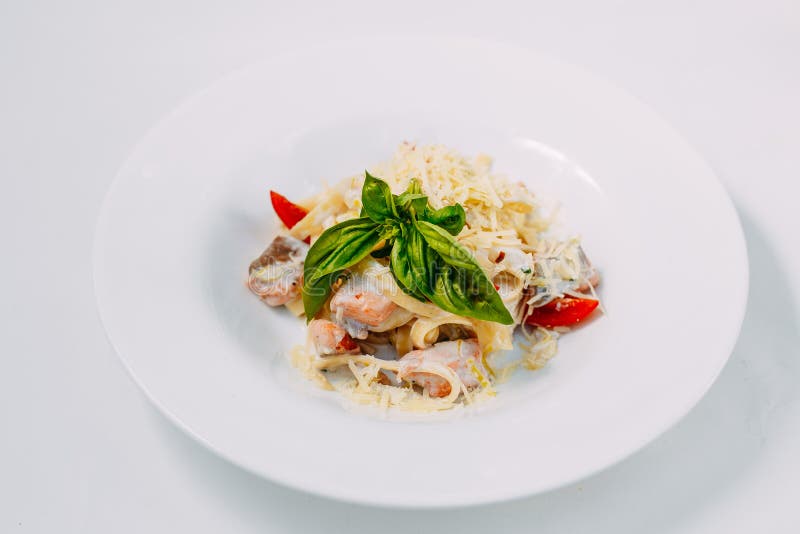 Fettuccine Pasta with Red Tomato Fish and Cheese Stock Photo - Image of ...
