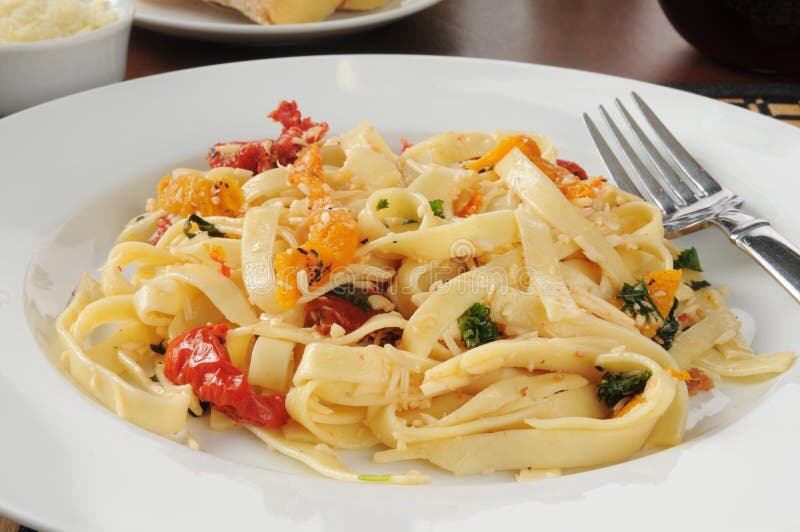 Fettuccini with Roasted Tomato Stock Image - Image of horizontal, plate ...