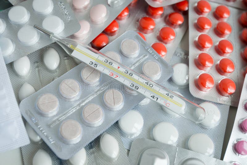 Fever Thermometer Showing a Temperature of 39 Degrees Celsius and Some ...