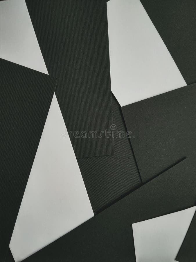 Few Black Papers Folded with Color Paper Close Up Stock Photo - Image ...