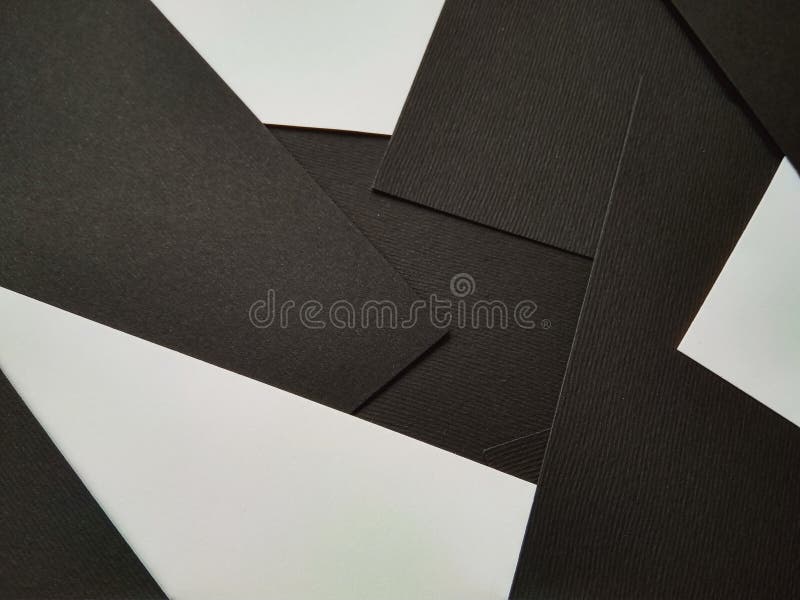 Few Black Papers Folded with Color Paper Close Up Stock Photo - Image ...