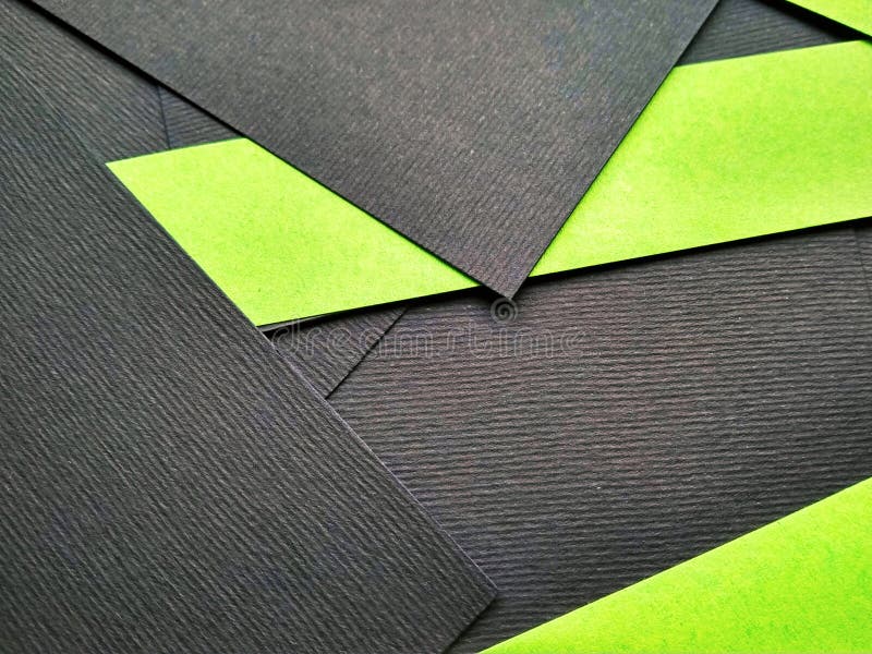 Few Black Papers Folded with Color Paper Close Up Stock Photo - Image ...