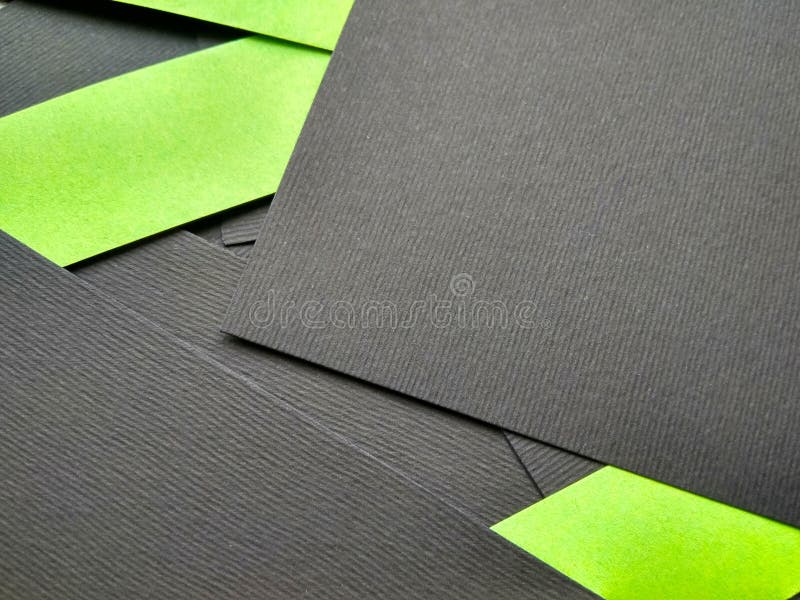 Few Black Papers Folded with Color Paper Close Up Stock Photo - Image ...