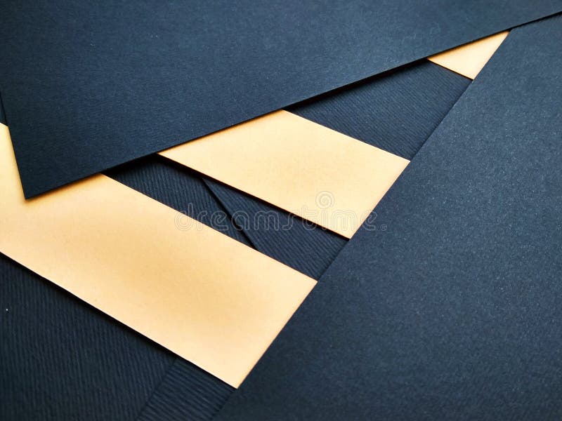Few Black Papers Folded with Color Paper Close Up Stock Photo - Image ...