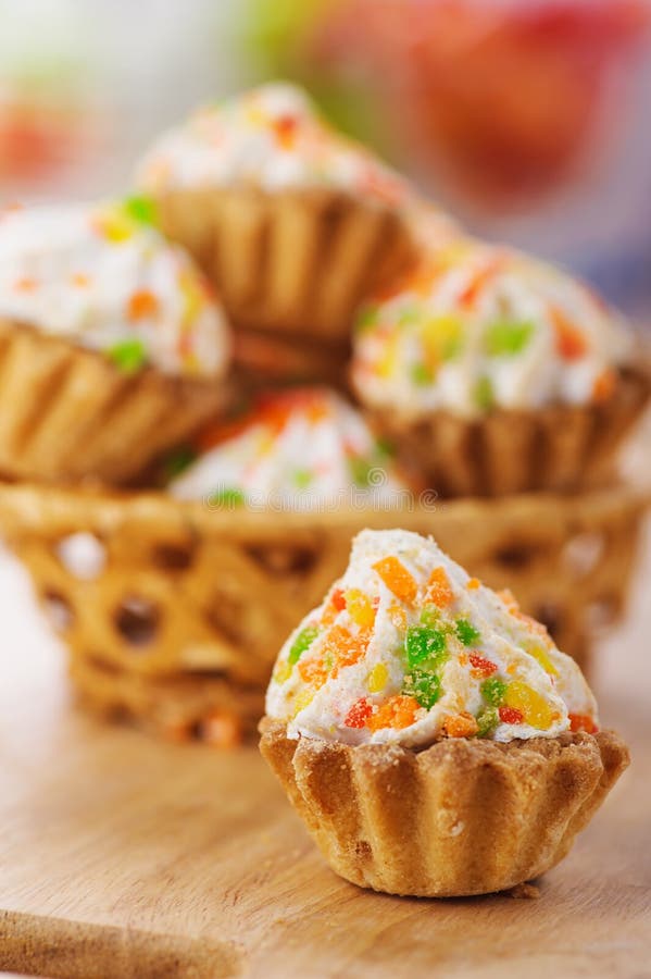 Few cakes in wicker basket stock photo. Image of food - 24200264