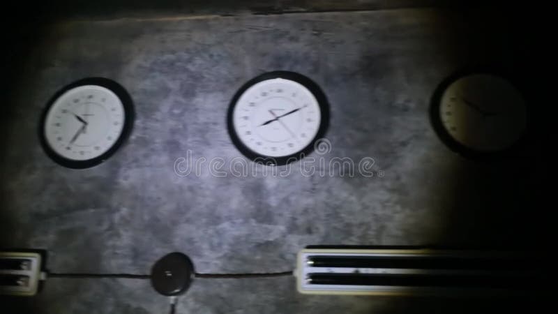 Few Clocks Hanging in Row on Wall in Light of Stock Footage - Video of ...