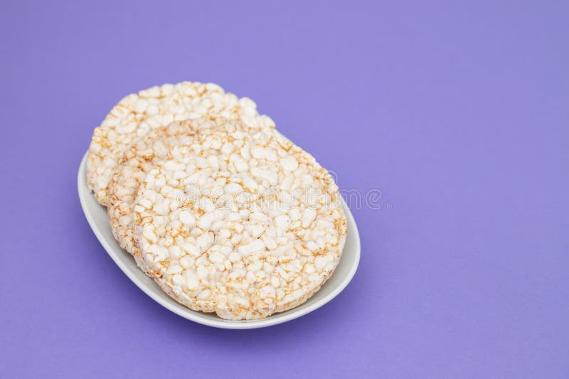 Few Crunchy Rice Cakes on White Dish Stock Photo - Image of table ...
