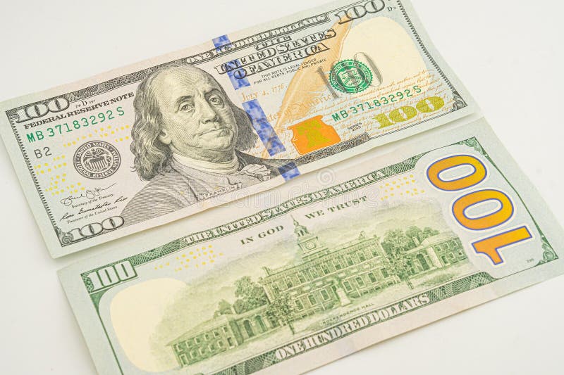 A Few 100 Dollar Bills with the Back Side Lying Around. the Back of a ...