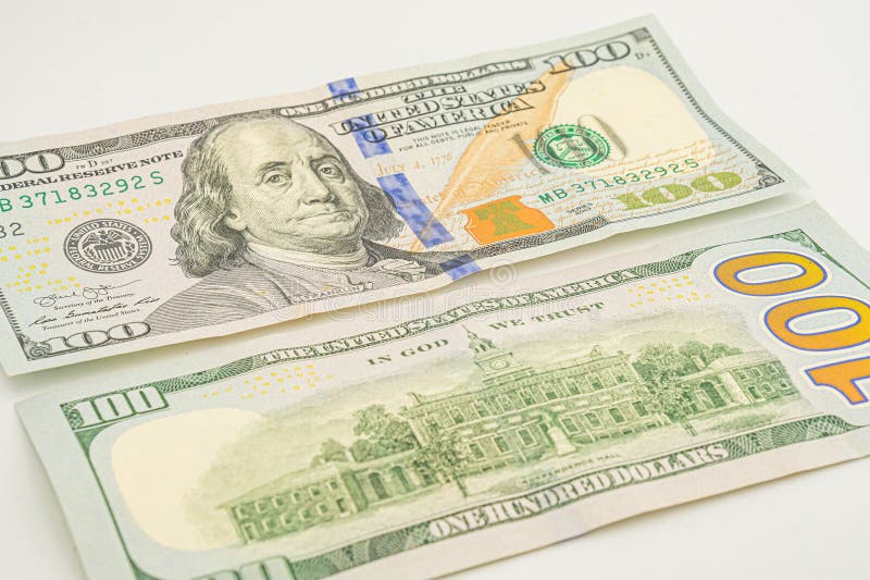 A Few 100 Dollar Bills with the Back Side Lying Around. the Back of a ...