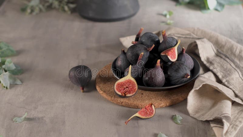 A few figs in a plate stock photo. Image of fruit, grey - 275555620