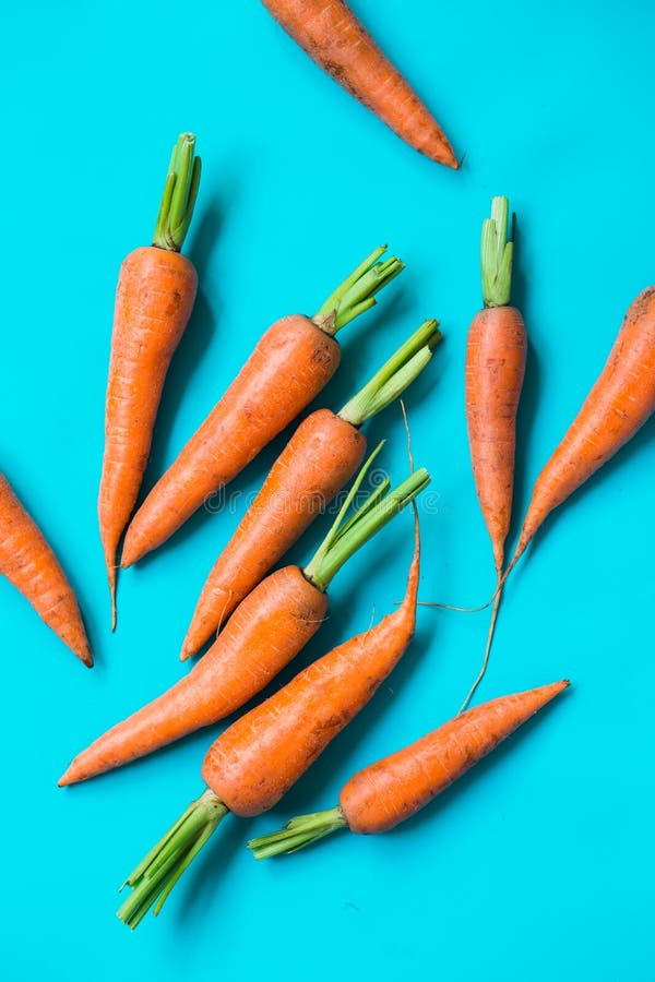 A Few Fresh Carrots on Blue Background Stock Image - Image of healthy ...