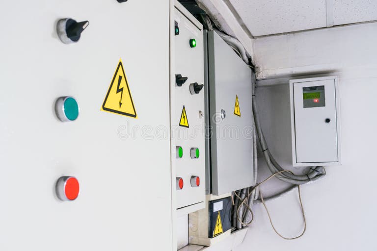 A Few Fuse Boxes are Installed on the Wall in the Basement. High ...