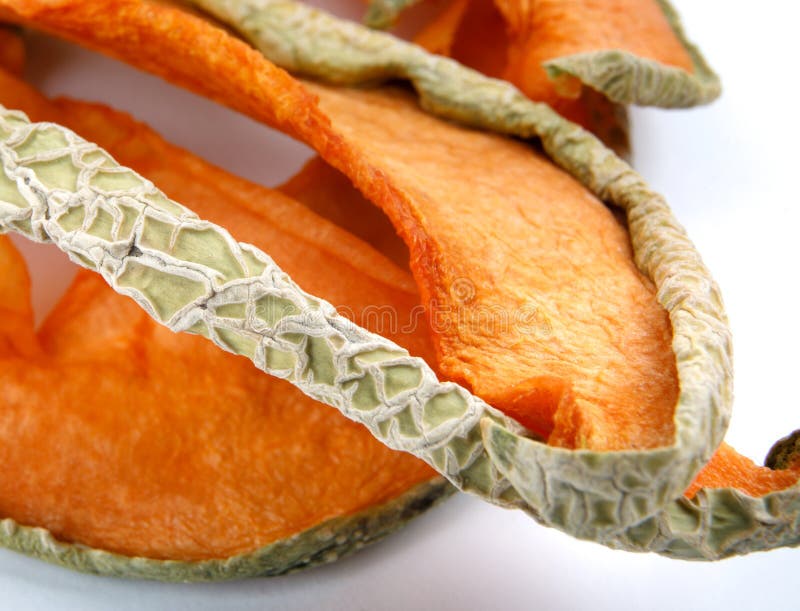 A Few Pieces of Dried Melon on a White Background. Dried Melon Stock ...