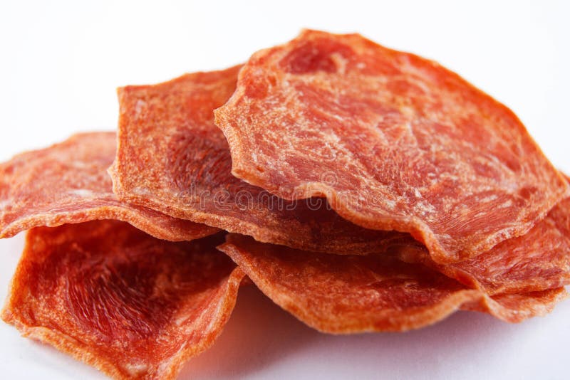 A Few Pieces of Meat Chips on a White Background. Meat Chips Stock ...