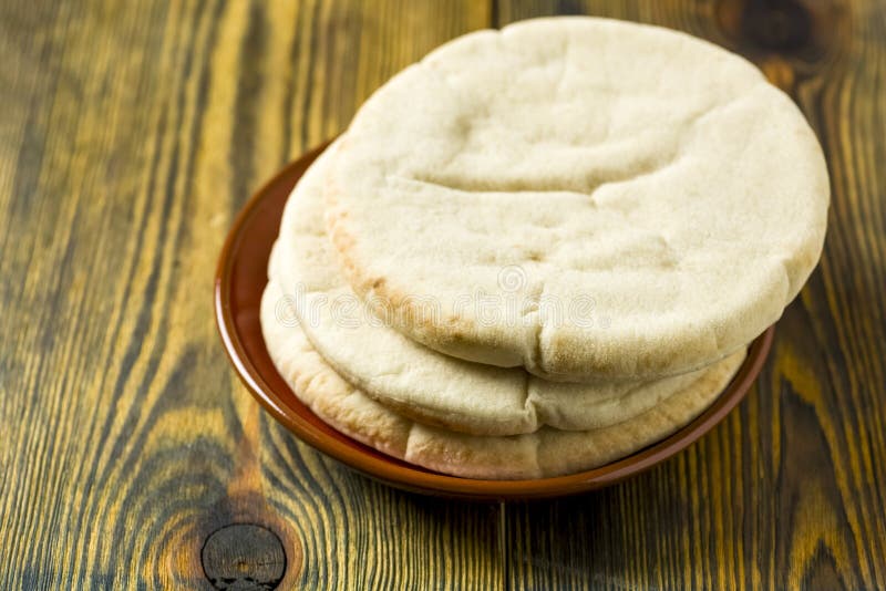 A Few Pita Breads on the Plate Stock Photo - Image of arabian, baker ...
