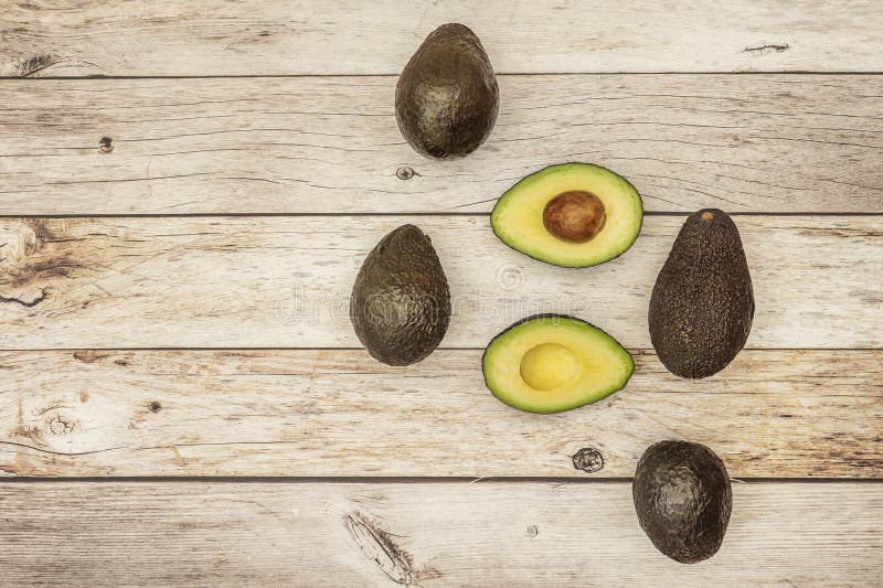 A Few Ripe Avocados, Some Cut in Half Stock Image - Image of exotic ...