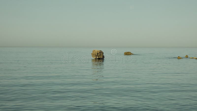 Few Stones Near Beach in the Sea Stock Image - Image of calm, locations ...