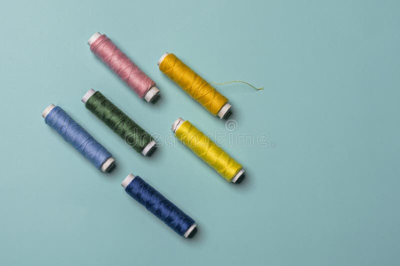 Red Unused Thread Spool on a Full Black Background Stock Photo - Image ...