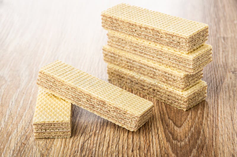 Stack Of Wafer In Saucer On Wooden Table Stock Image - Image of yellow ...