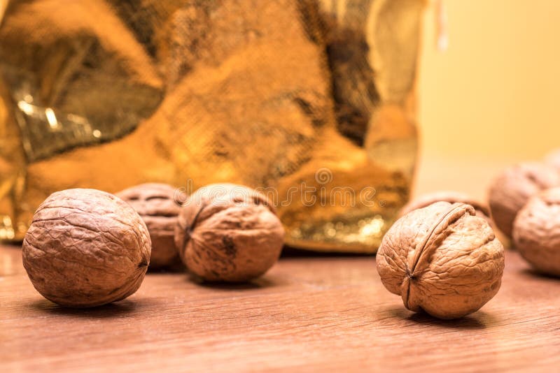 Few Wallnuts Wooden Background Golden Package Behind Stock Photos ...