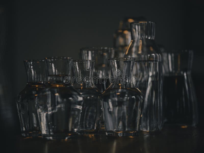 Few Water Mugs in Low Key Light Stock Photo - Image of closeup, alcohol ...