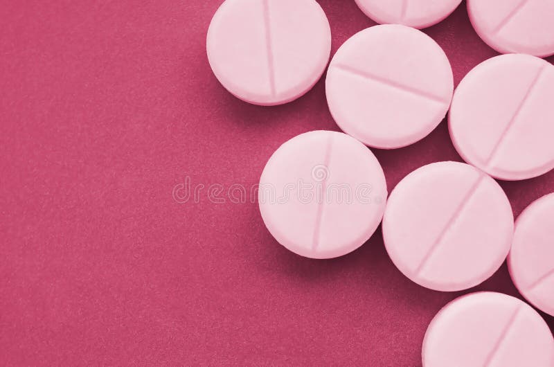 A Few White Tablets Lie on a Bright Background Surface. Background ...