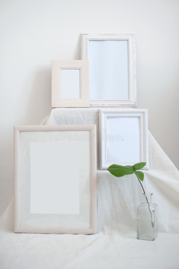 A few white wedding frames stock photo. Image of decor - 112257762