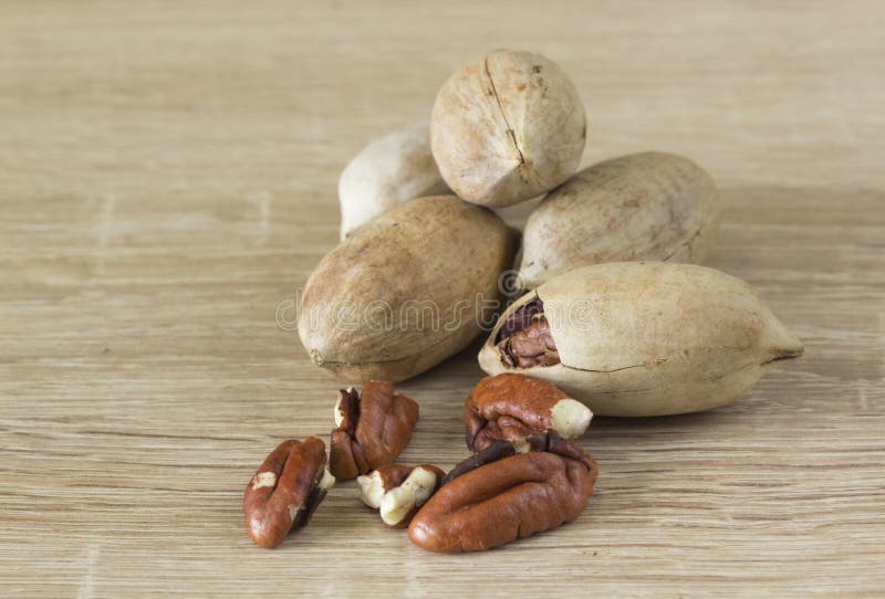A Few Whole and Peeled Pecans Stock Photo - Image of peeled, closeup ...