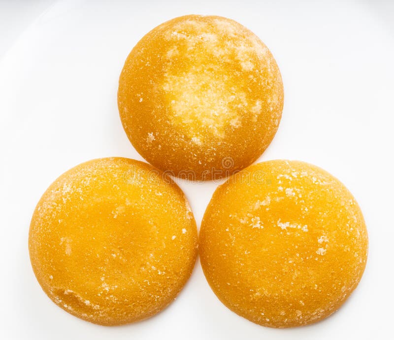 Few Whole Round Pieces of Palm Sugar on Gray Stock Image - Image of ...