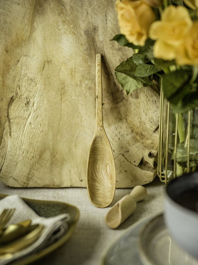 Wood spoons on a set table stock photo. Image of cook - 270614642