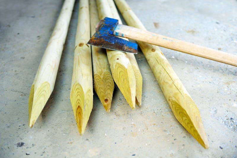 A Few Wooden Stakes with Axe Stock Photo - Image of stake, scrambling ...