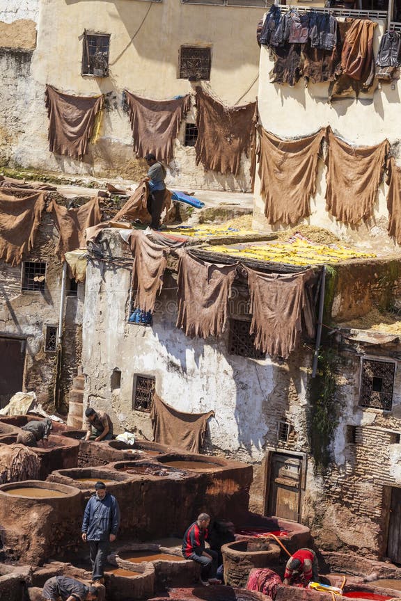 FEZ, MOROCCO - JUNE 10. 2016: Workers at the Chouwara Tannery in ...