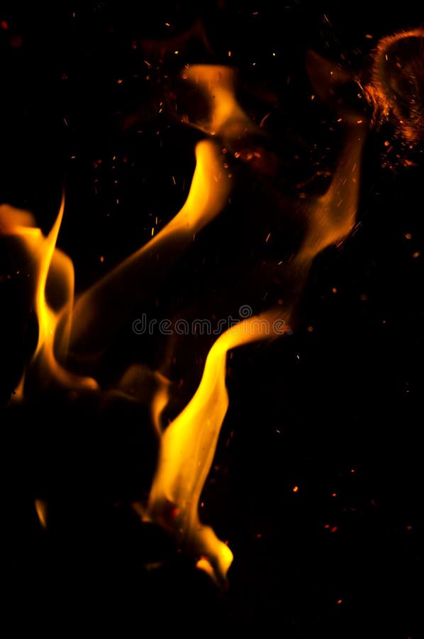 Fiamme arancioni del fuoco fotografia stock. Immagine di combustibile ...
