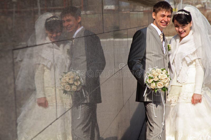 Fiance and Bride and Reflection on Wall Stock Image - Image of ...