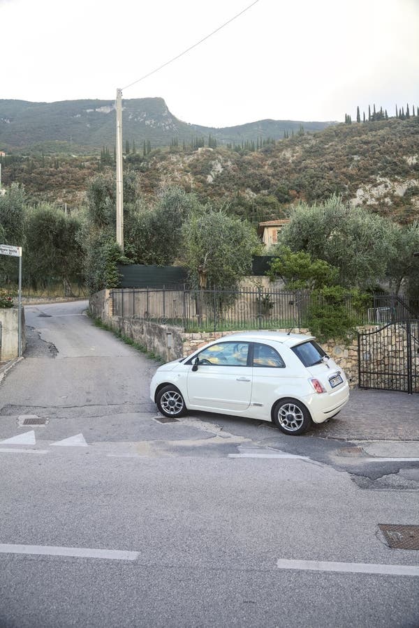 Fiat 500 on a Country Road Next To an Olive Tree Grove Editorial Photo ...