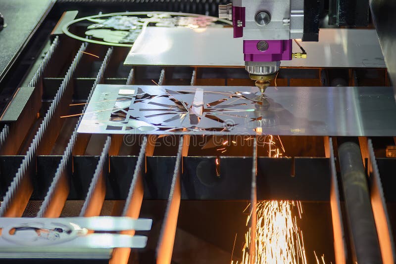 The Fiber Laser Cutting Machine Cut the Metal Plate with the Sparkling ...