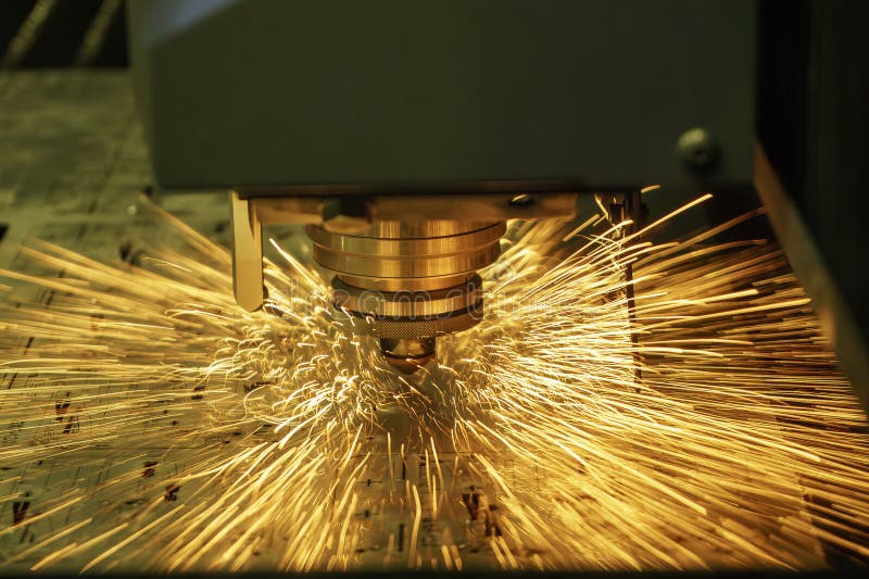 The Fiber Laser Cutting Machine Cut the Metal Plate with the Sparkling ...