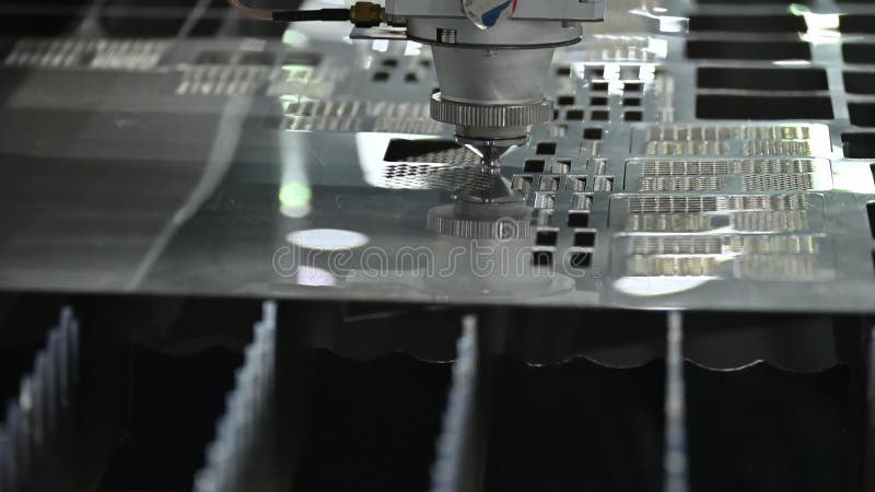 The Fiber Laser Cutting Machine Cut the Metal Plate with the Sparkling ...