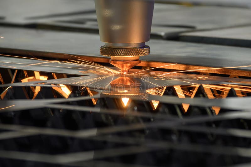 The Fiber Laser Cutting Machine Cut the Metal Plate with the Sparkling ...